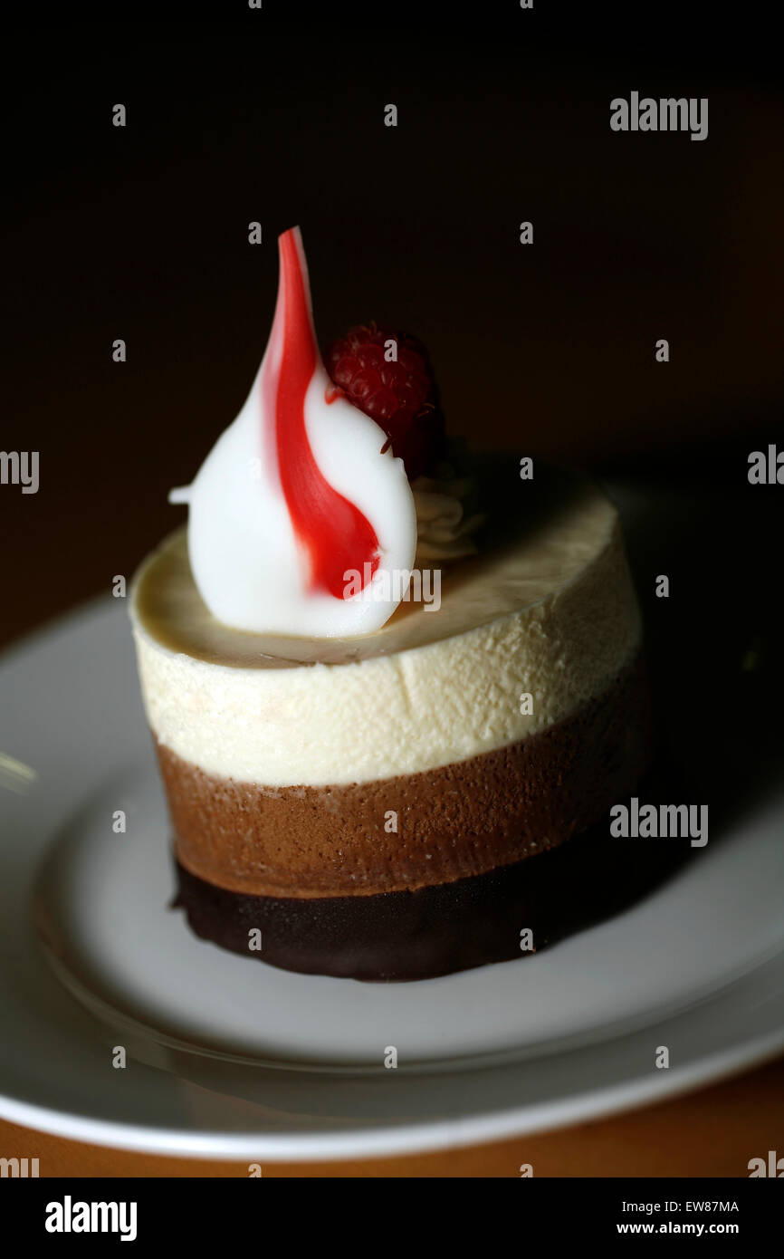 Triple Chocolate Mousse with Strawberry Garnish Stock Photo - Alamy