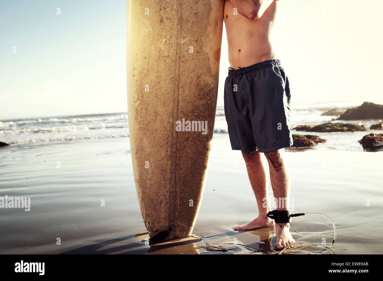 Man holding board Stock Photo - Alamy