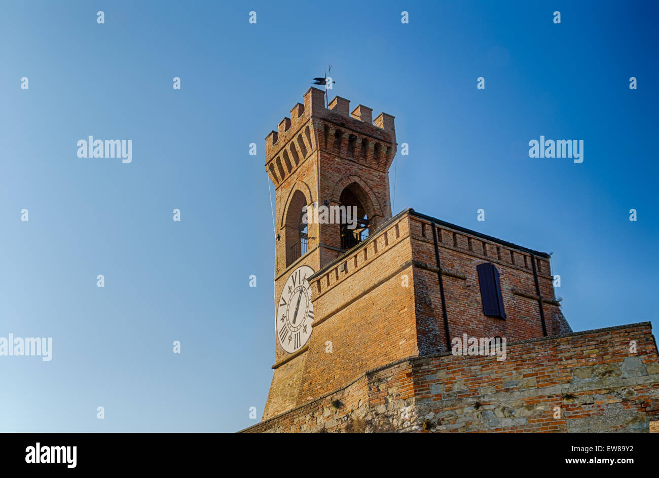 Medieval crenellated brick wall clock hi-res stock photography and ...