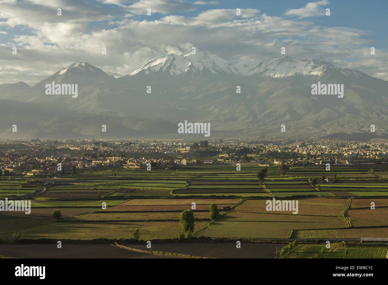 City of Arequipa, Peru with its iconic fields and volcano Chachani in ...