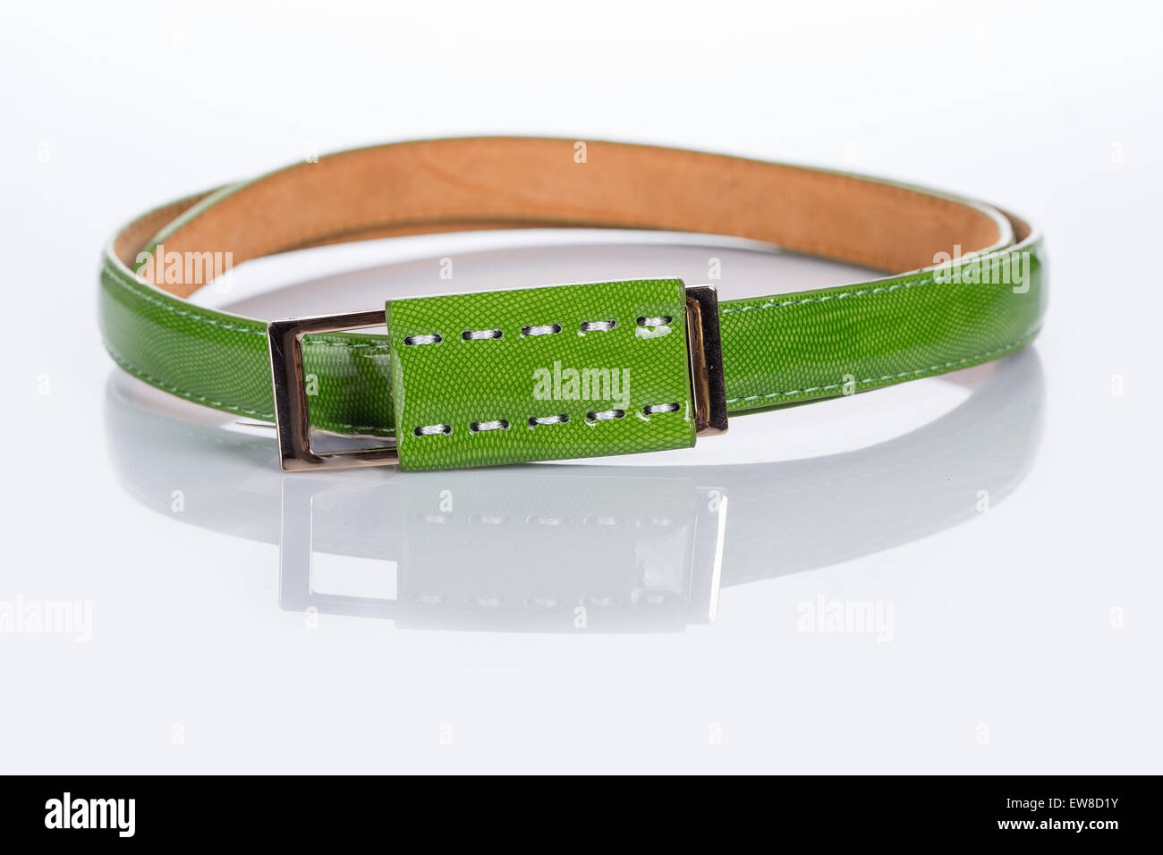 thin green female belt buckle with fine Stock Photo - Alamy