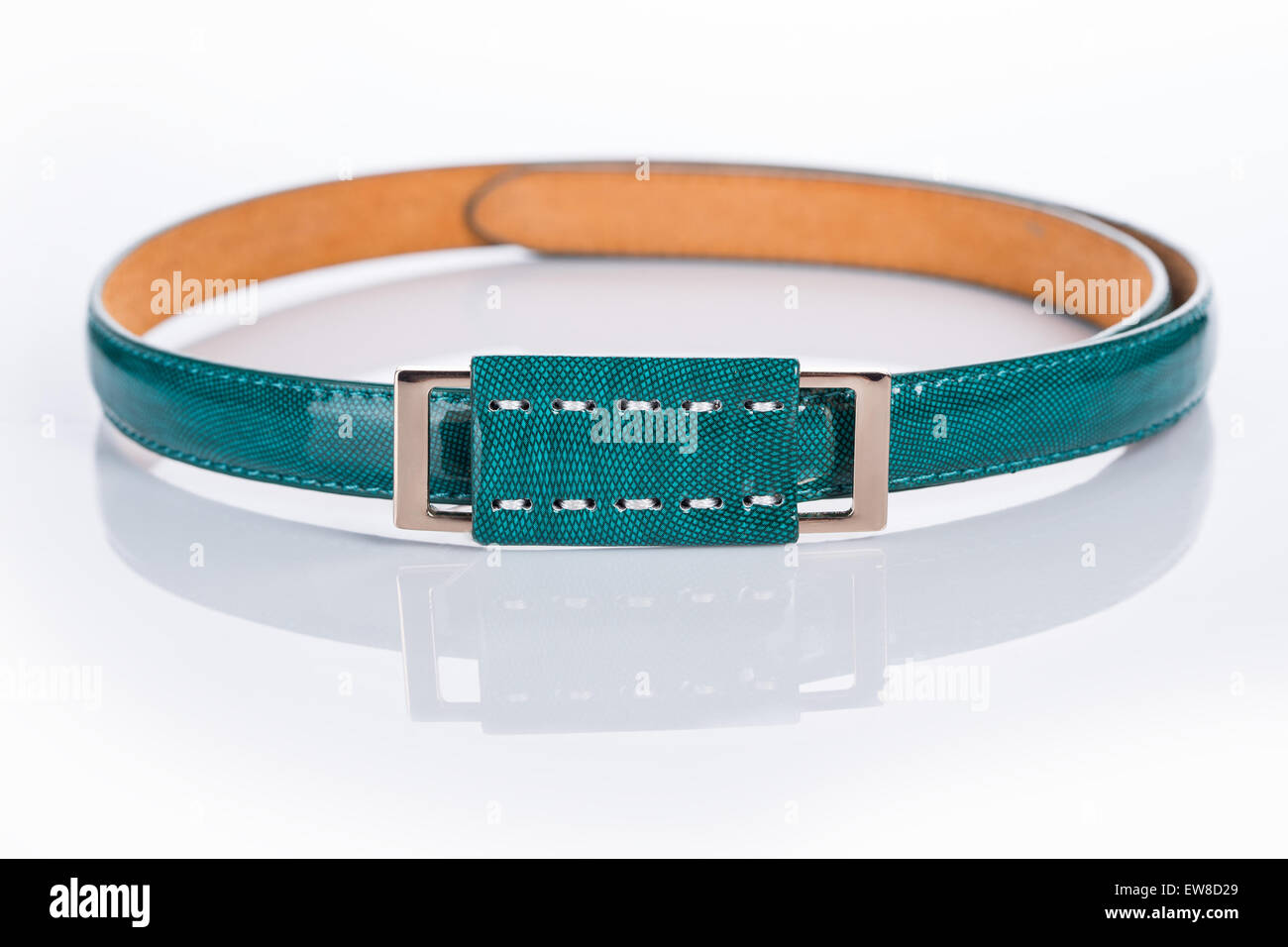 thin green female belt buckle with fine Stock Photo - Alamy