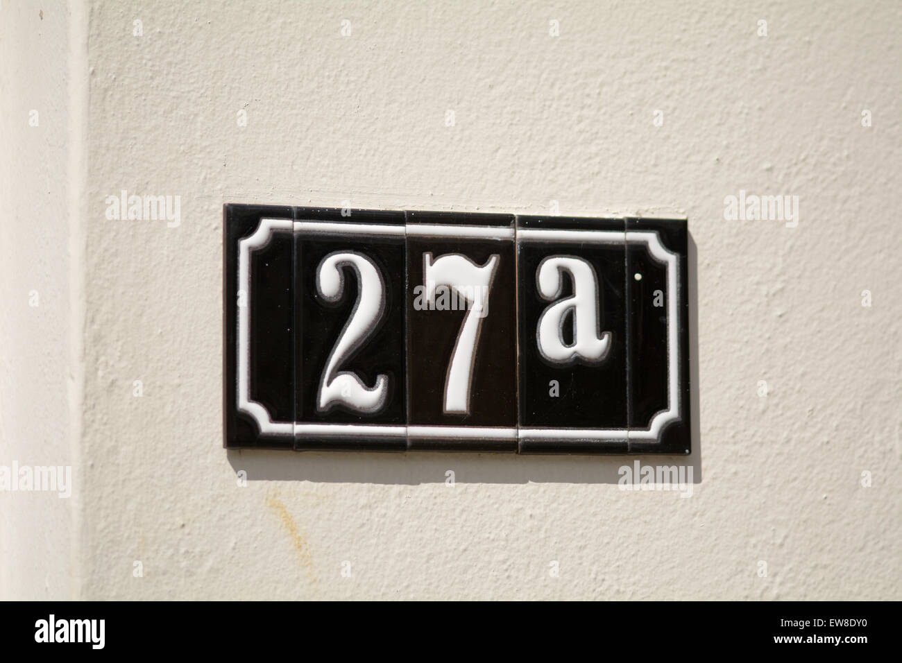 House number 27a sign Stock Photo - Alamy