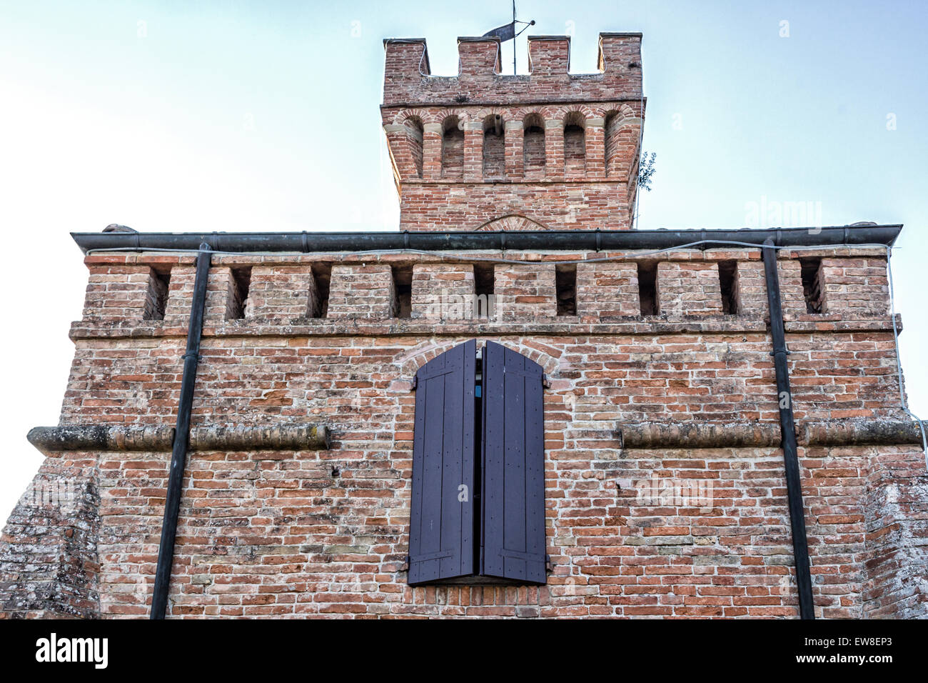 Medieval crenellated brick wall clock hi-res stock photography and ...