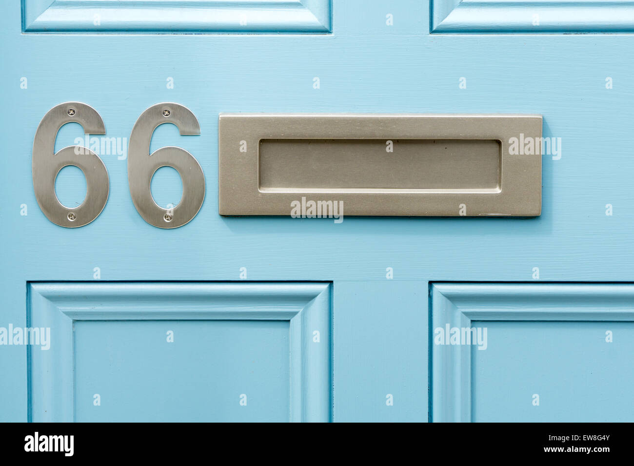 Door number 66 sixty six and letterbox conceptual image closeup Stock ...
