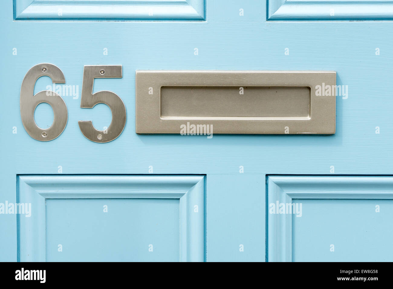 Door number 65 sixty five and letterbox conceptual image closeup Stock ...
