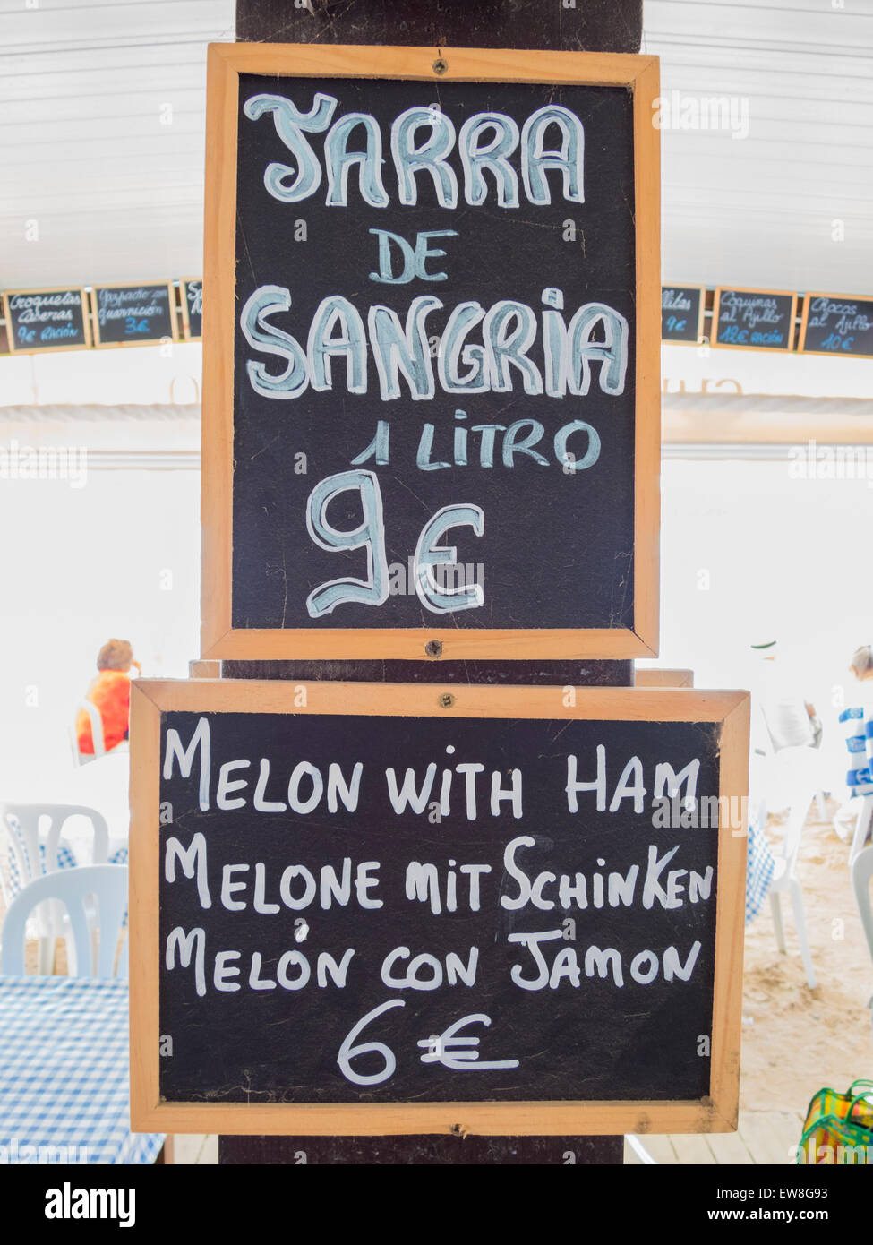 black placard spanish white handwritten in wall with typical menu food ...