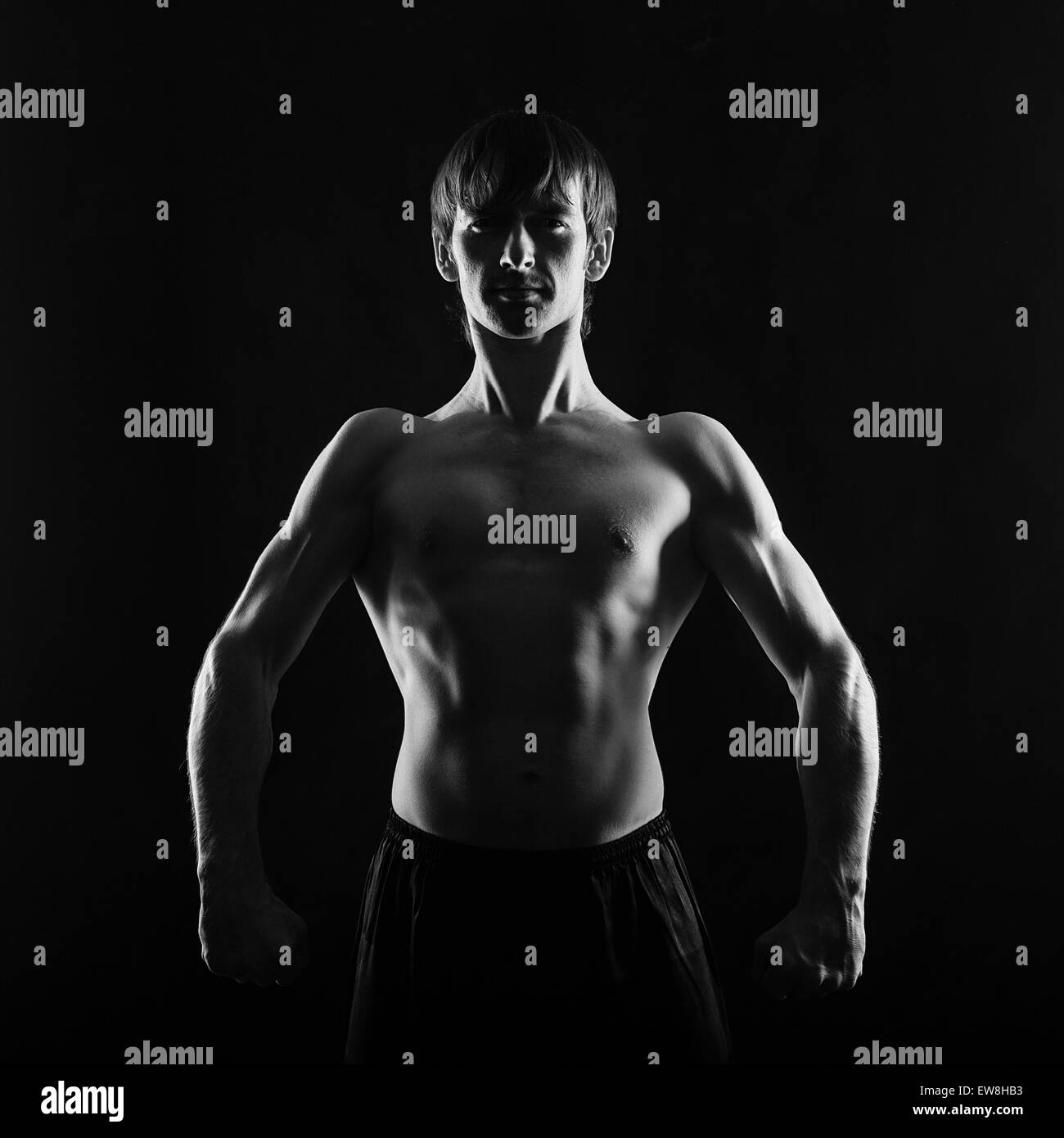 Male fighter frontal photo. Low key. The concept of male power Stock ...