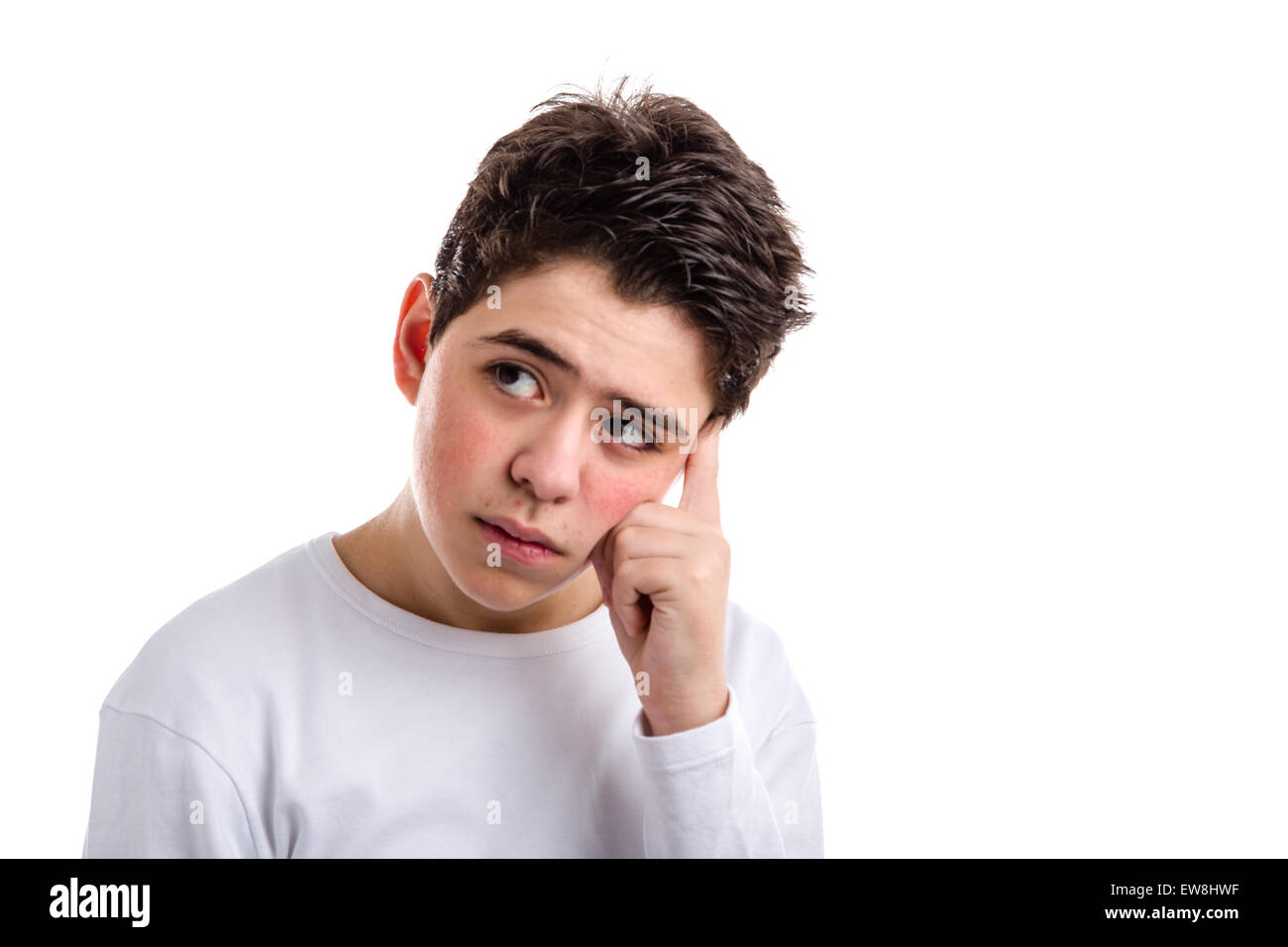Worried Hispanic boy with acne skin in a white long sleeve t-shirt ...