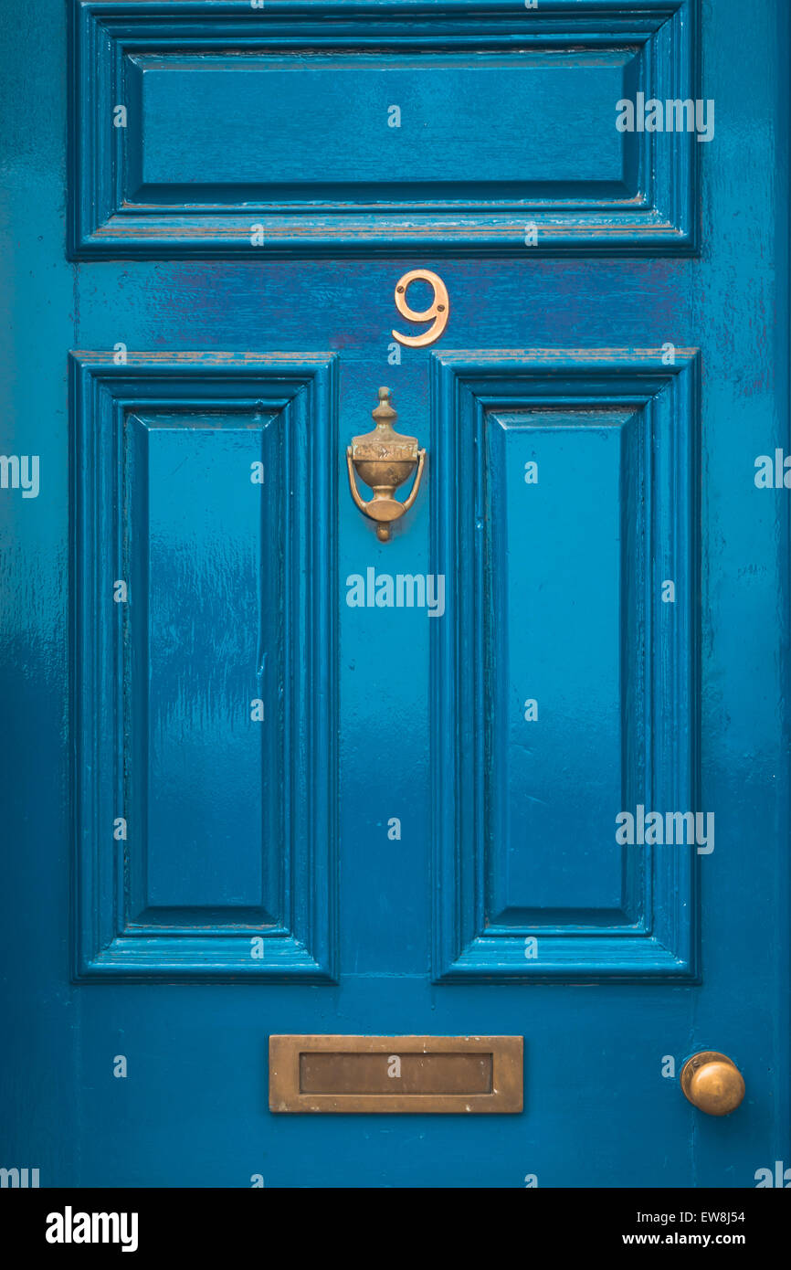 Door number 9 nine knocker and letterbox concept closeup Stock Photo ...