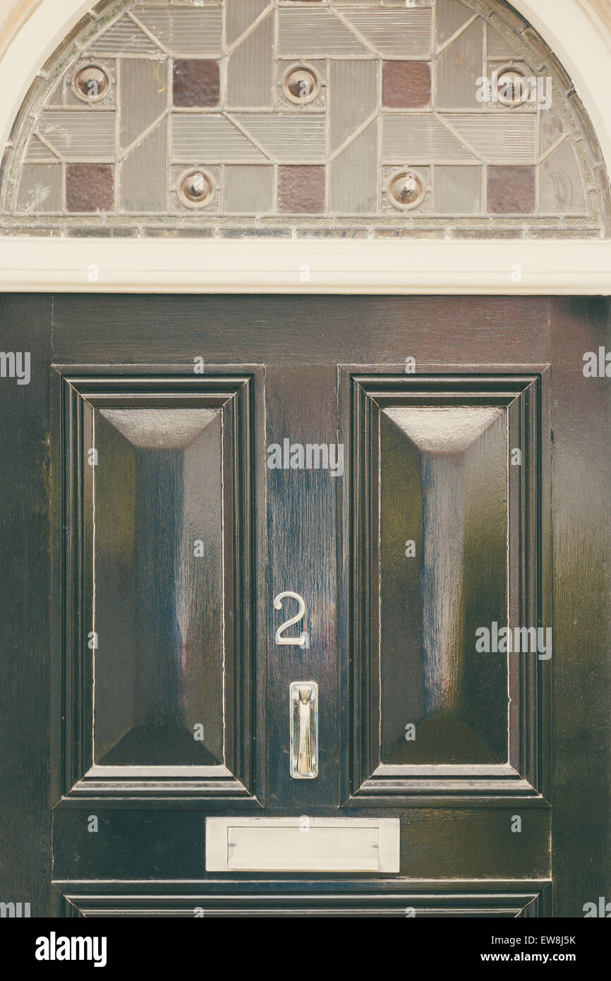 Door number 2 two door knocker and letterbox conceptual image closeup ...