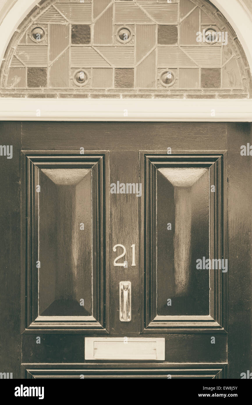 Door number 21 twenty one door knocker and letterbox conceptual image ...