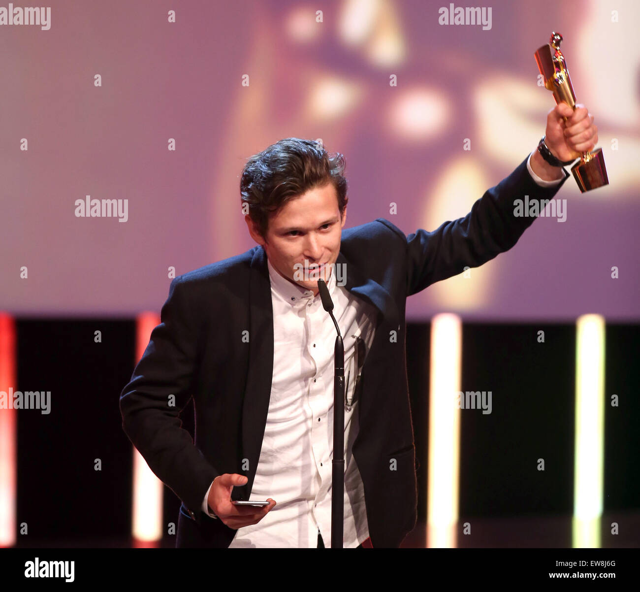 Berlin, Germany. 19th June, 2015. Swiss actor Joel Basman receives the ...