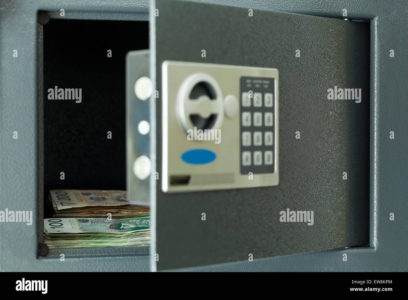 open safe full with notes (hundred and two zloty Stock Photo - Alamy