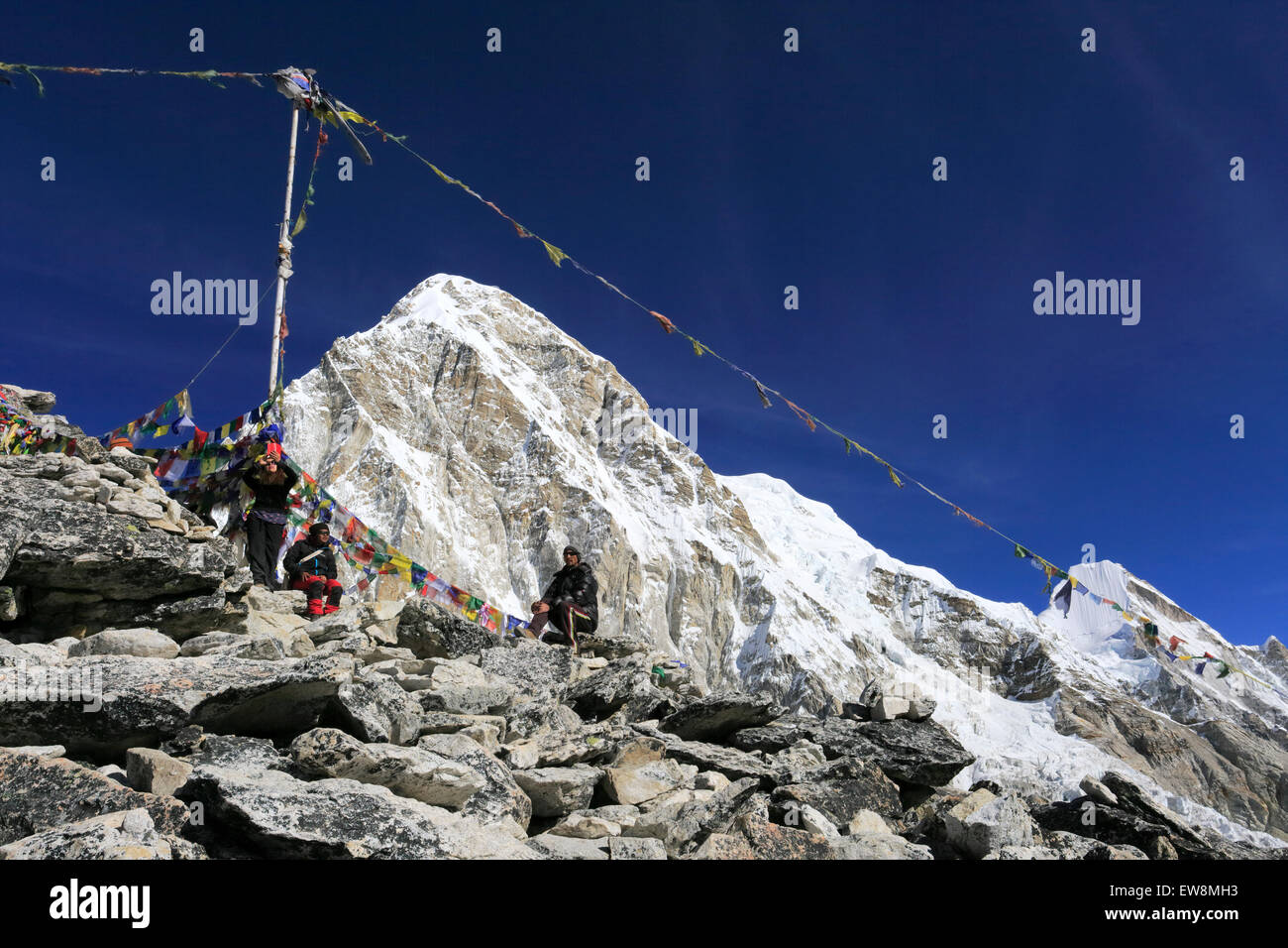 Adult Trekkers walking up Kala Patthar mountain, UNESCO World Heritage ...