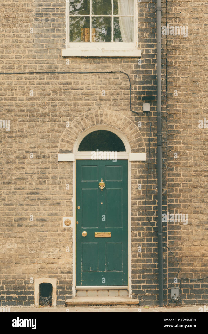 Front view of a Terraced house in English University Town, Cambridge ...