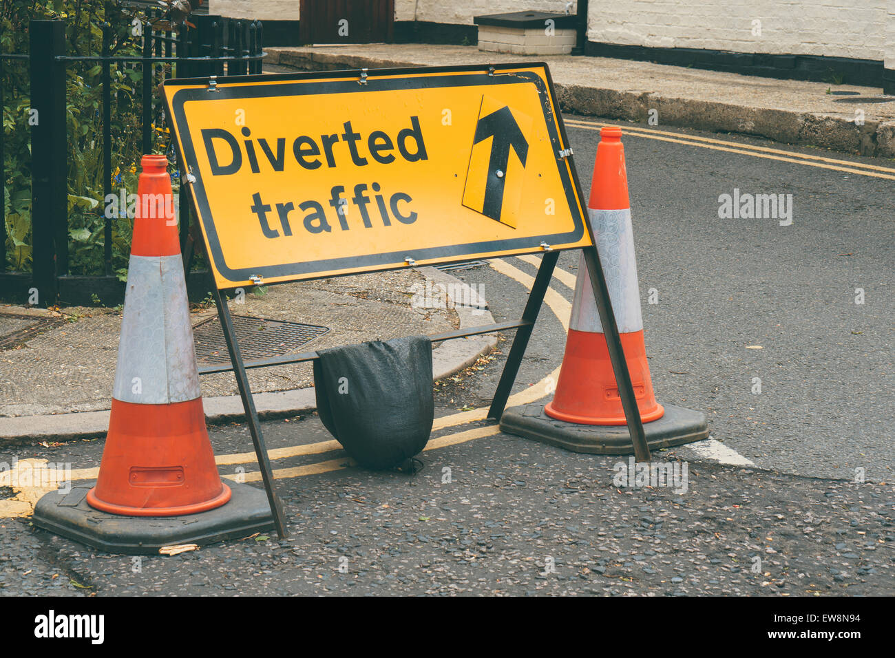 Traffic Sign on an urban road 'Diverted Traffic' directing traffic to ...