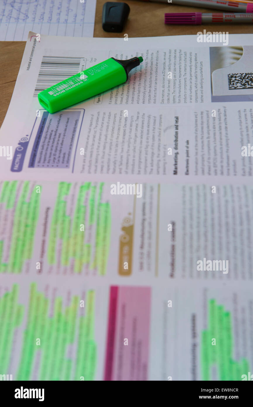 Highlighter pens on A level homework and revision Stock Photo - Alamy