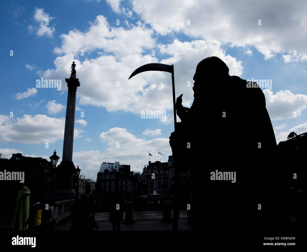 The grim reaper in Central London in Trafalgar Square with Nelson's ...