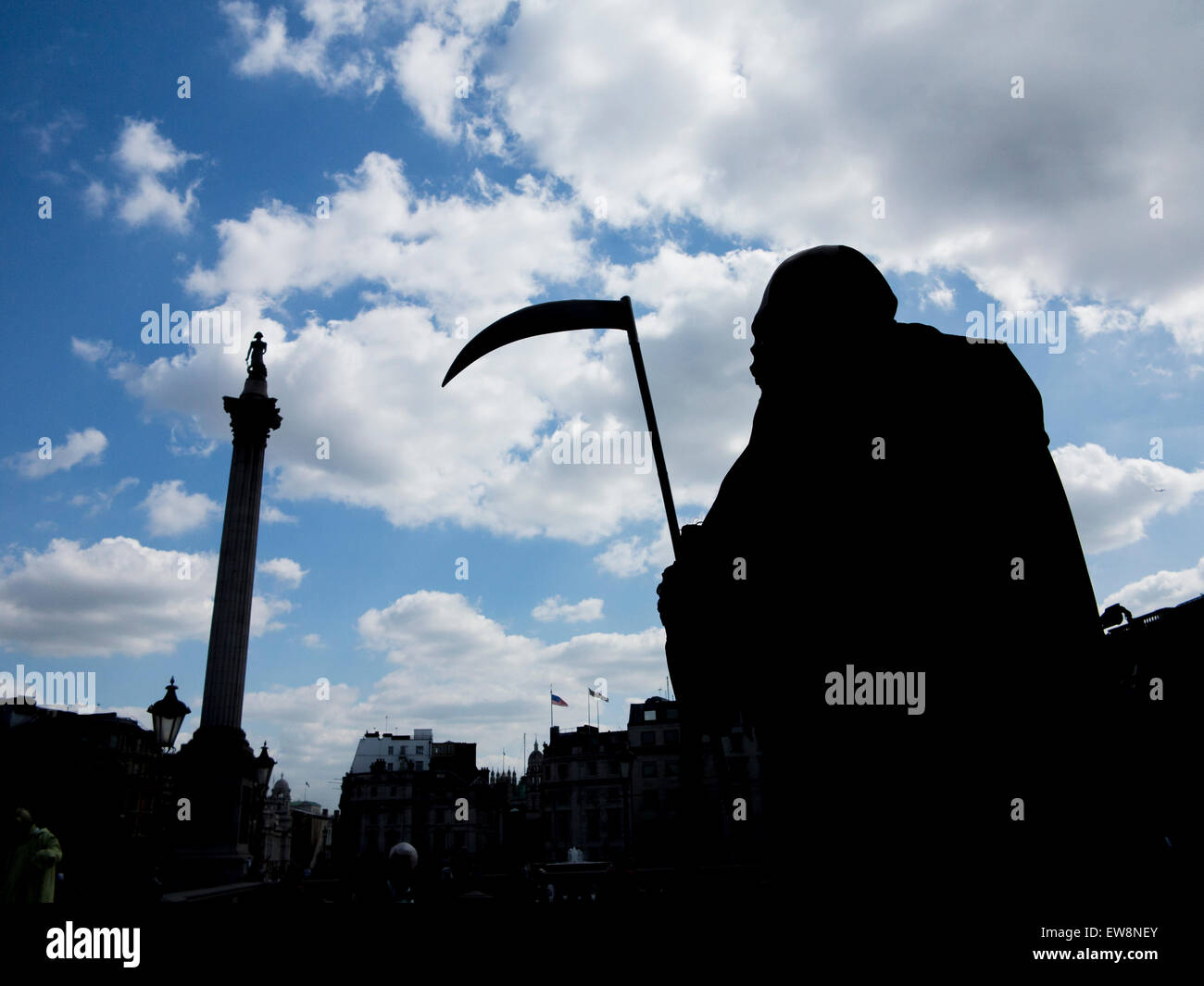 The grim reaper in Central London in Trafalgar Square with Nelson's ...