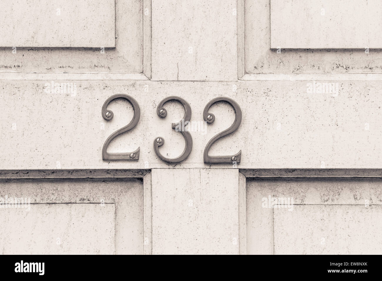 Door number 232 two hundred thirty two conceptual monochrome image ...