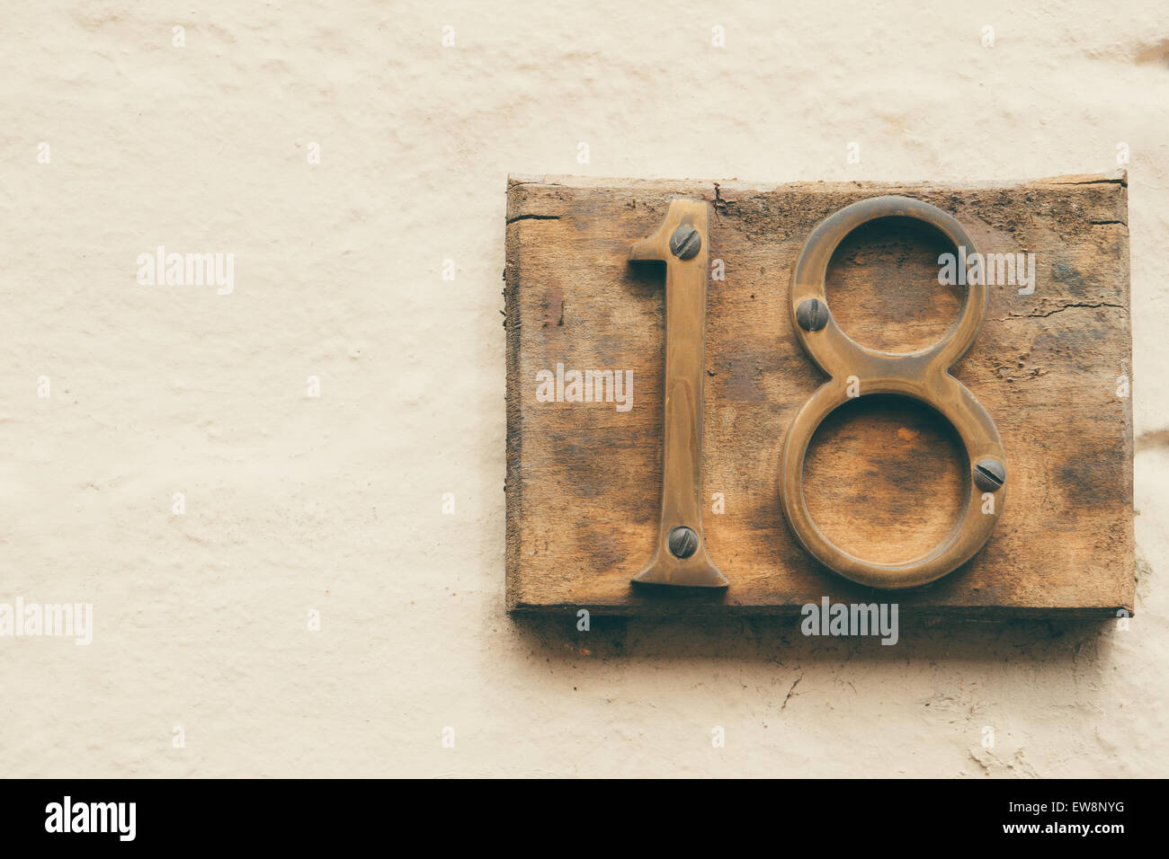 Number Eighteen 18 digits on wooden plate concept Stock Photo - Alamy