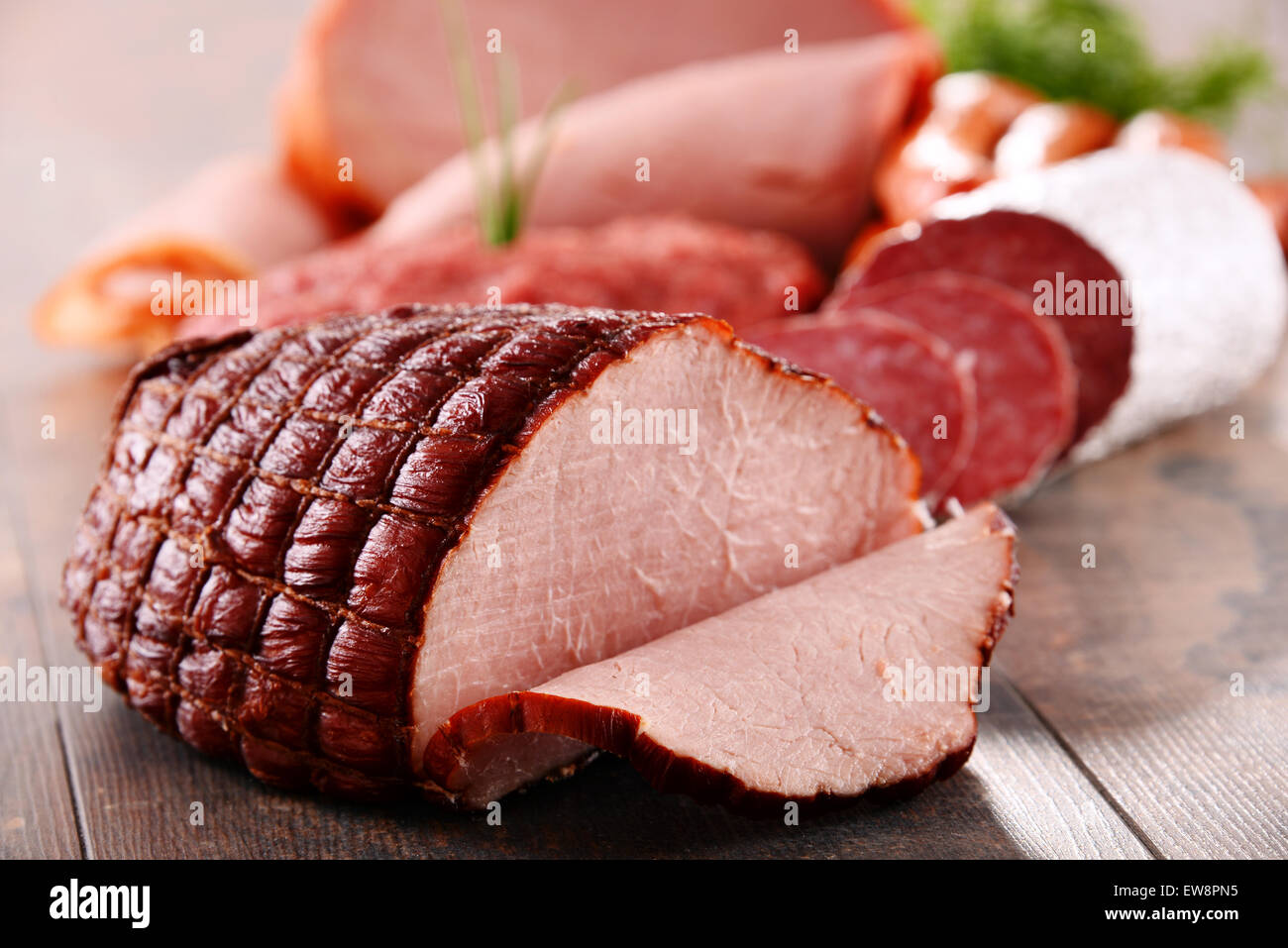 Assorted meat products including ham and sausages Stock Photo - Alamy