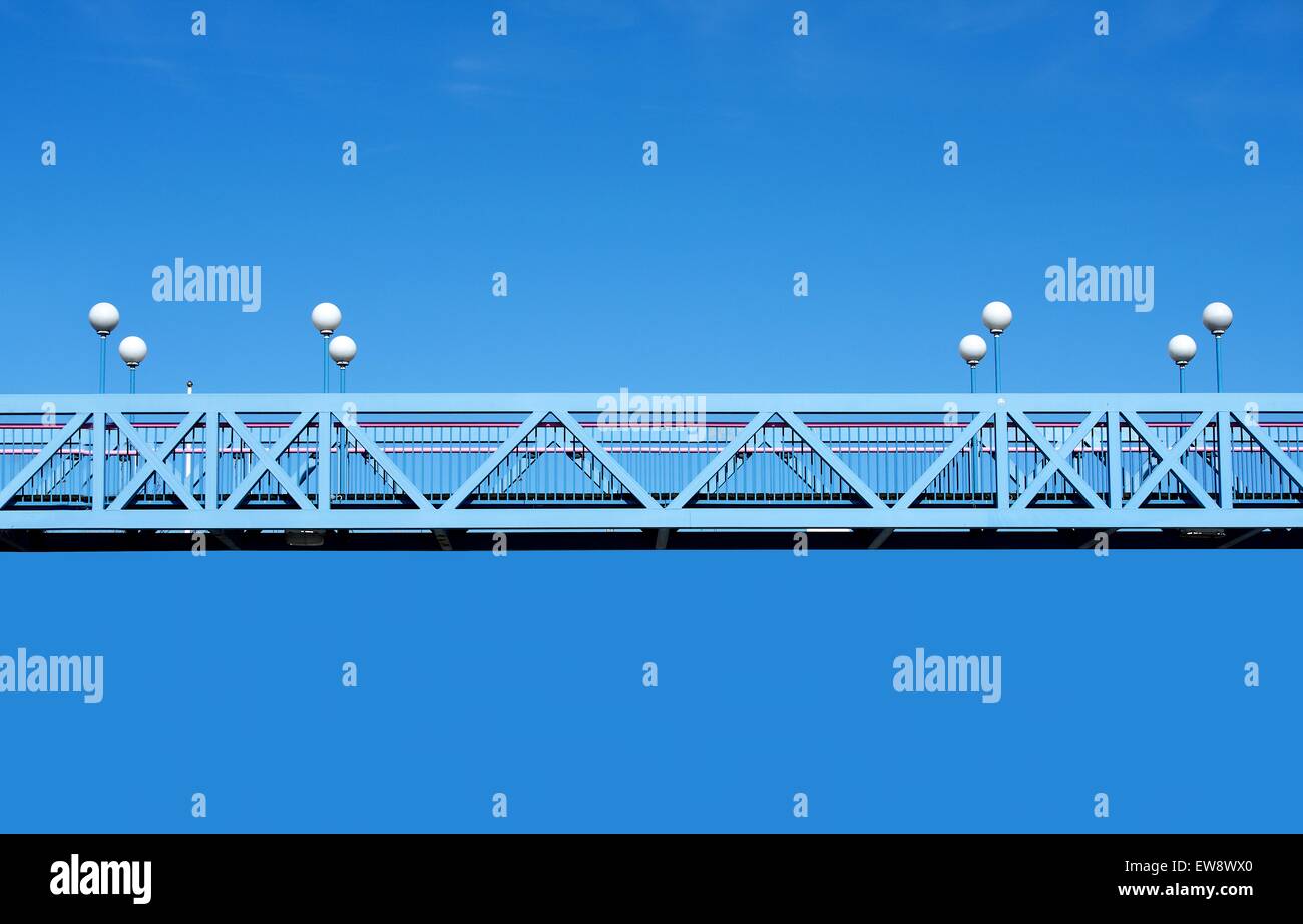 Fragment of bridges with lamps in blue sky background, architectural ...