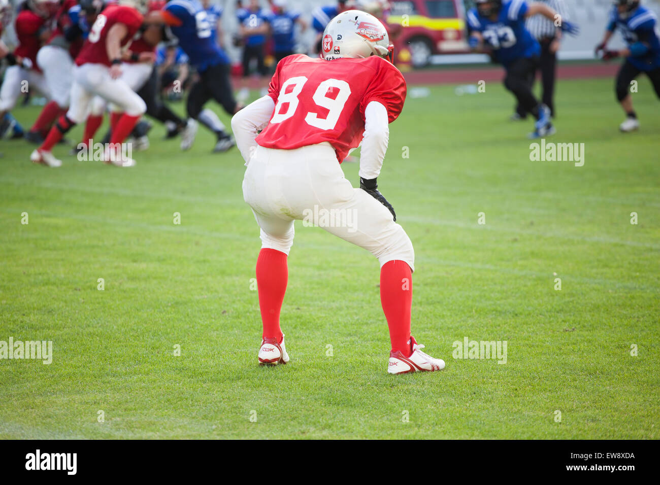 american-football-player-in-defense-stock-photo-alamy