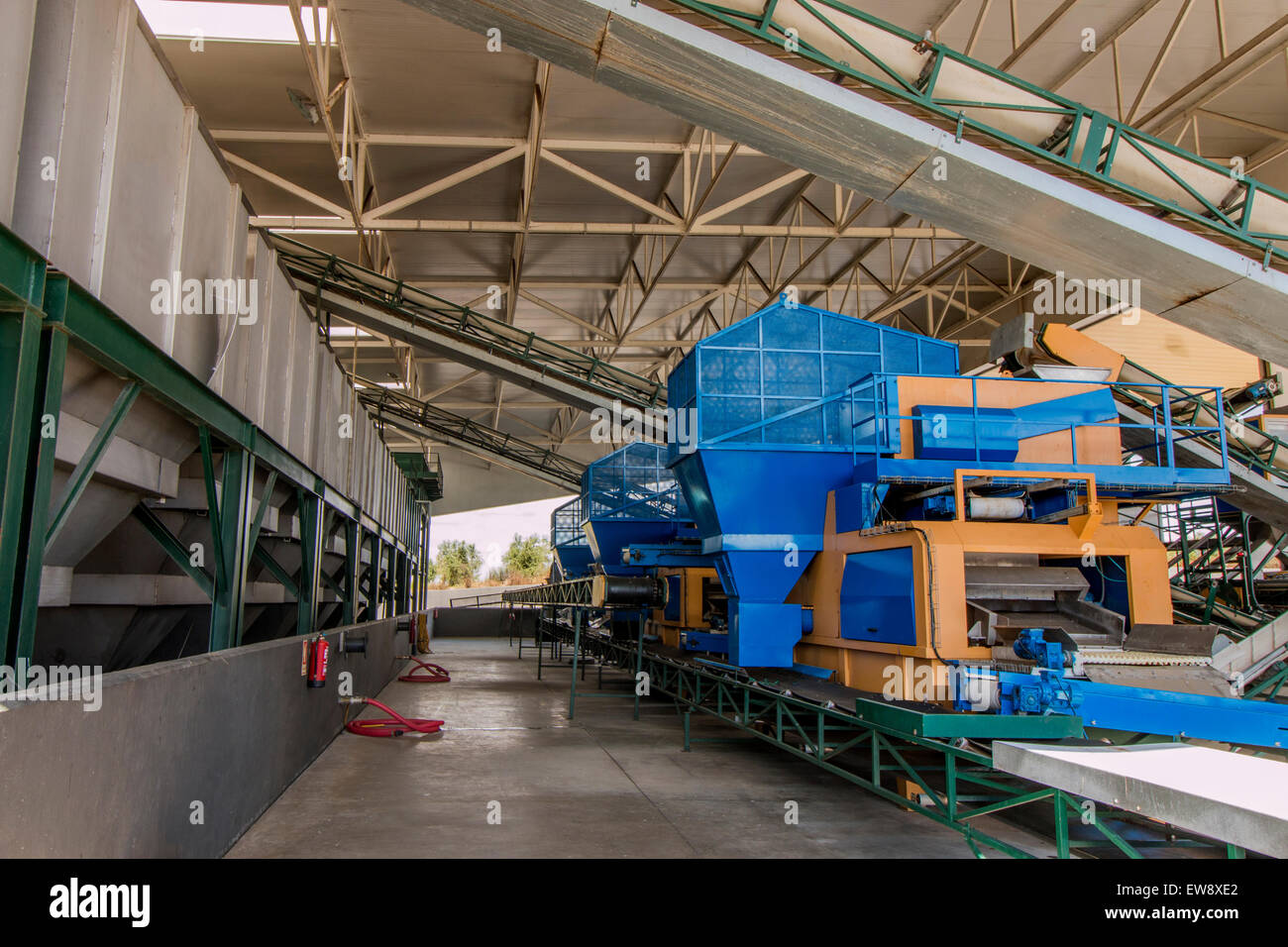 View of a modern processing unit machinery for olive oil Stock Photo ...