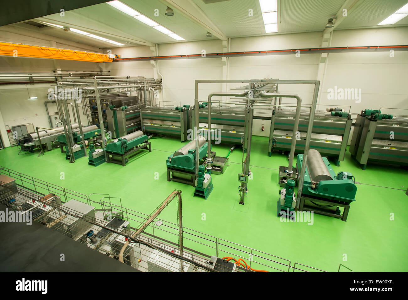 View of a modern processing unit machinery for olive oil Stock Photo ...