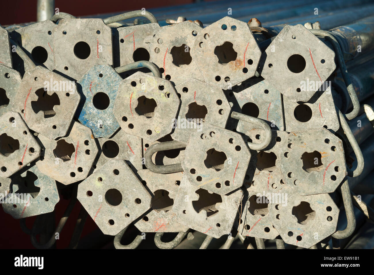 Steel scaffolding parts stored at a construction site Stock Photo - Alamy