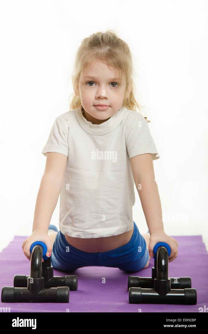 Four-year girl Europeans engaged in physical exercises Stock Photo - Alamy