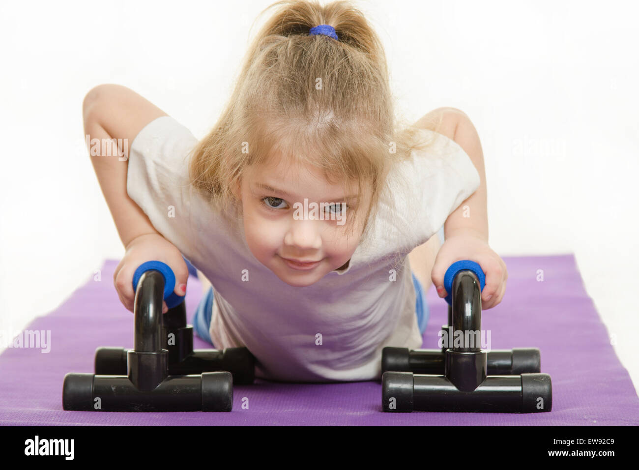 Four-year girl Europeans engaged in physical exercises Stock Photo - Alamy