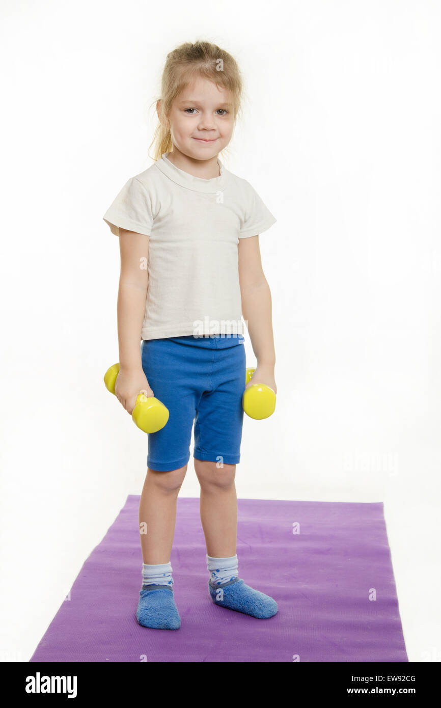 Four-year girl Europeans engaged in physical exercises Stock Photo - Alamy