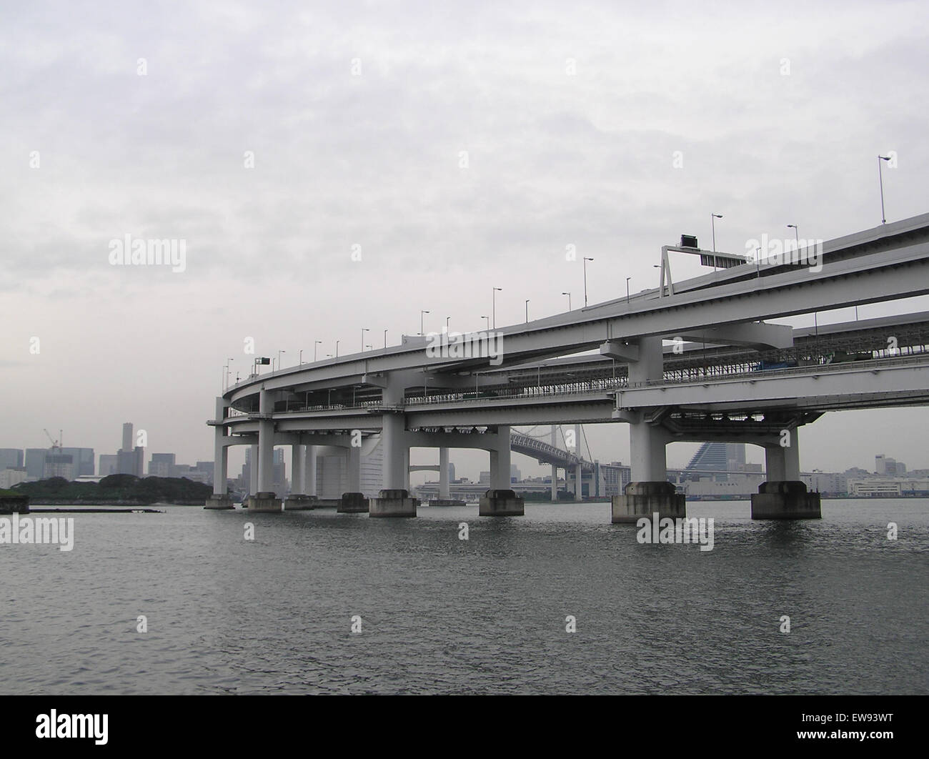 The Rainbow Bridge, captured on October 11, 2003, spans Tokyo Harbor ...