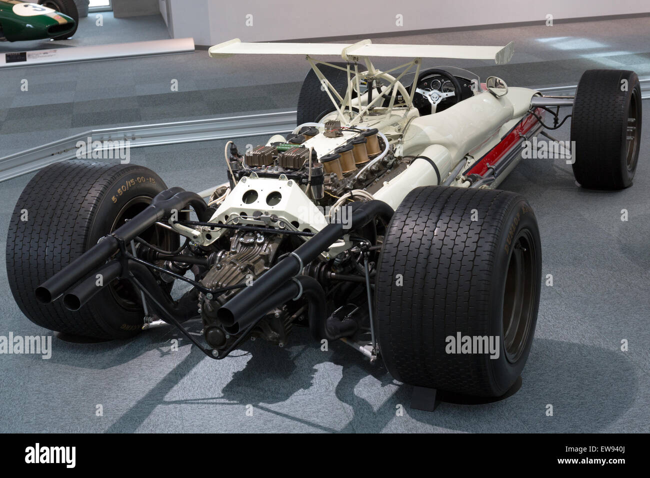 Rear-right view of the Honda RA302 Formula One car displayed at the ...