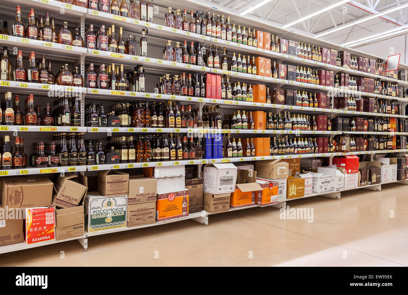 Showcase alcoholic beverages at the hypermarket Auchan Stock Photo - Alamy