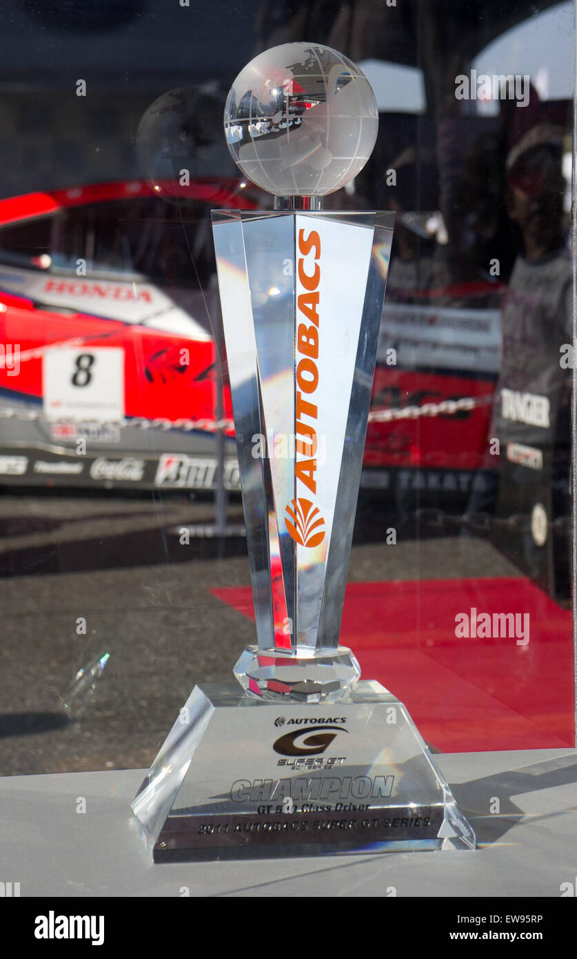 The 2011 Super GT GT500 class drivers' champion trophy symbolizes ...