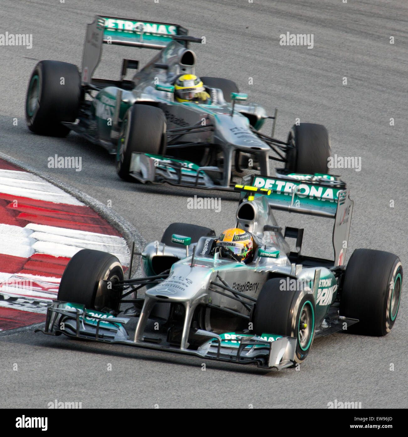 Mercedes AMG Petronas drivers Lewis Hamilton and Nico Rosberg competing ...