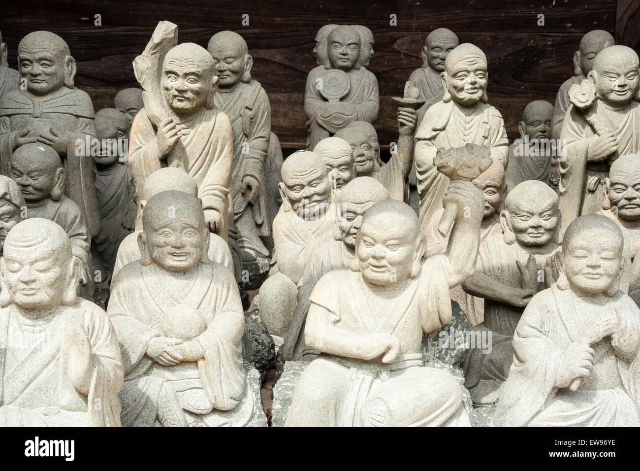 Japan, Miyajima. Small Rakan statues of Buddhist monks, disciples of ...