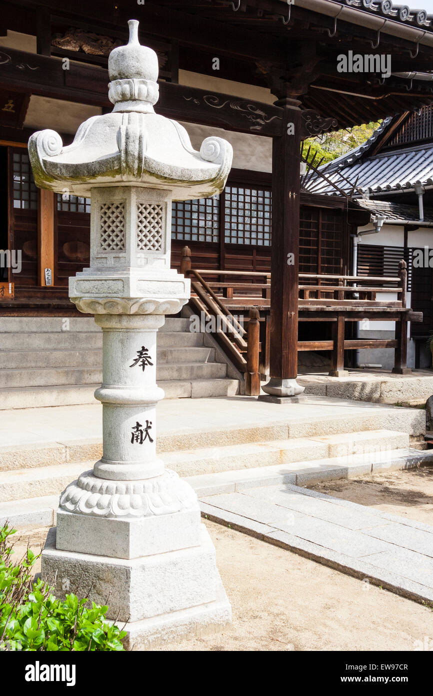 Japan, Onomichi, Jikoji Buddhist temple. New looking stone pedestal ...