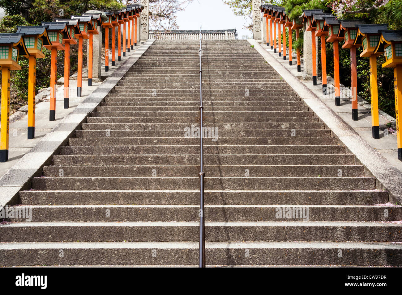 Japan, Onomichi, Saikokuji temple. Long flight of stone steps up hill ...