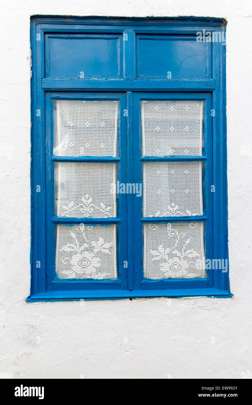 Typical blue portuguese window against a white wall Stock Photo - Alamy