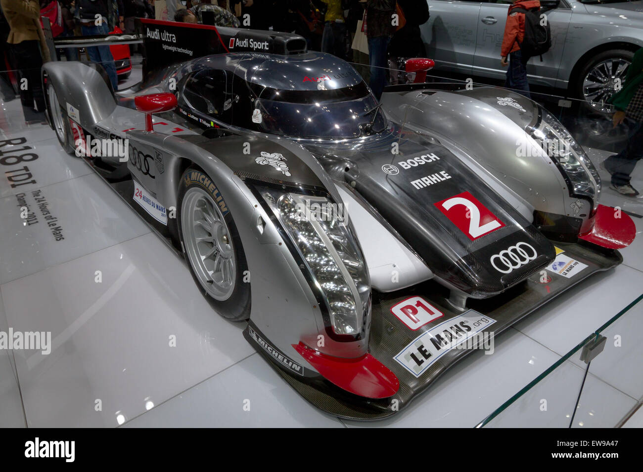 The Audi R18 TDI, displayed at the 2011 Tokyo Motor Show, is a high ...