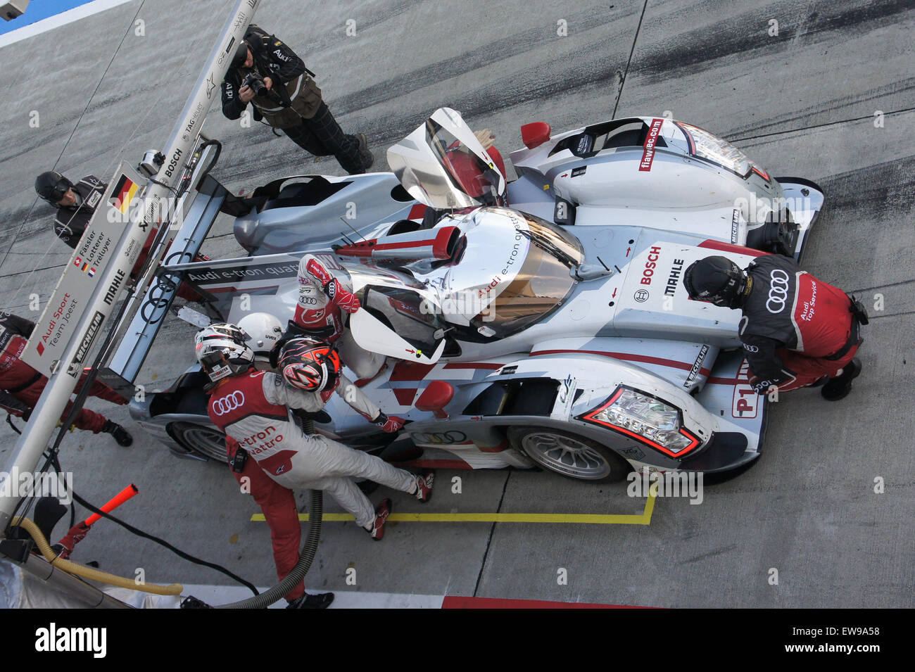 This image shows the Audi Sport Team Joest practicing a pit stop during ...