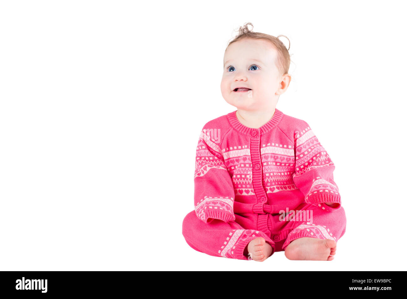Sweet baby girl in a pink sweater with hearts pattern, isolated on ...