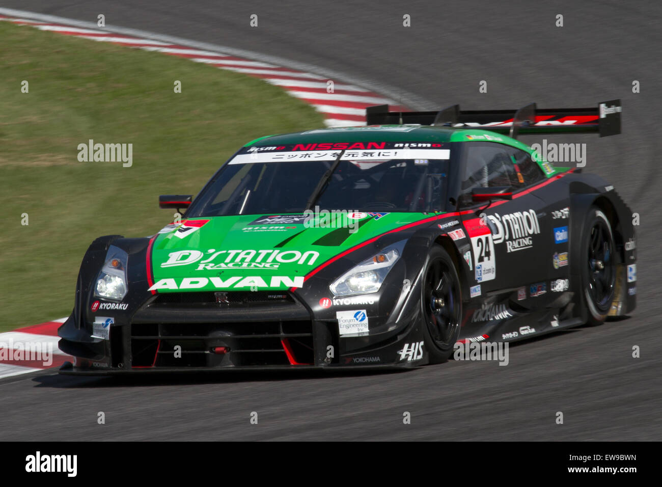 Daiki Sasaki competes in the 2014 Super GT Suzuka Race, showcasing his ...