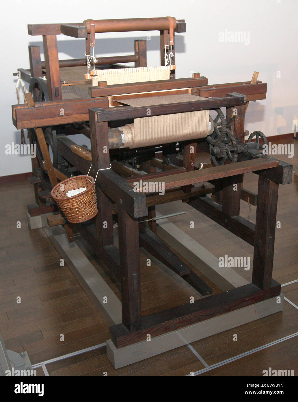 This late 19th-century Japanese foot-operated loom represents a ...