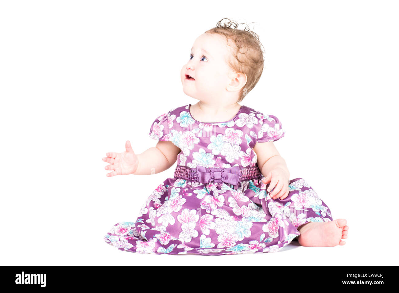 Beautiful little girl in a purple dress, isolated on white Stock Photo ...